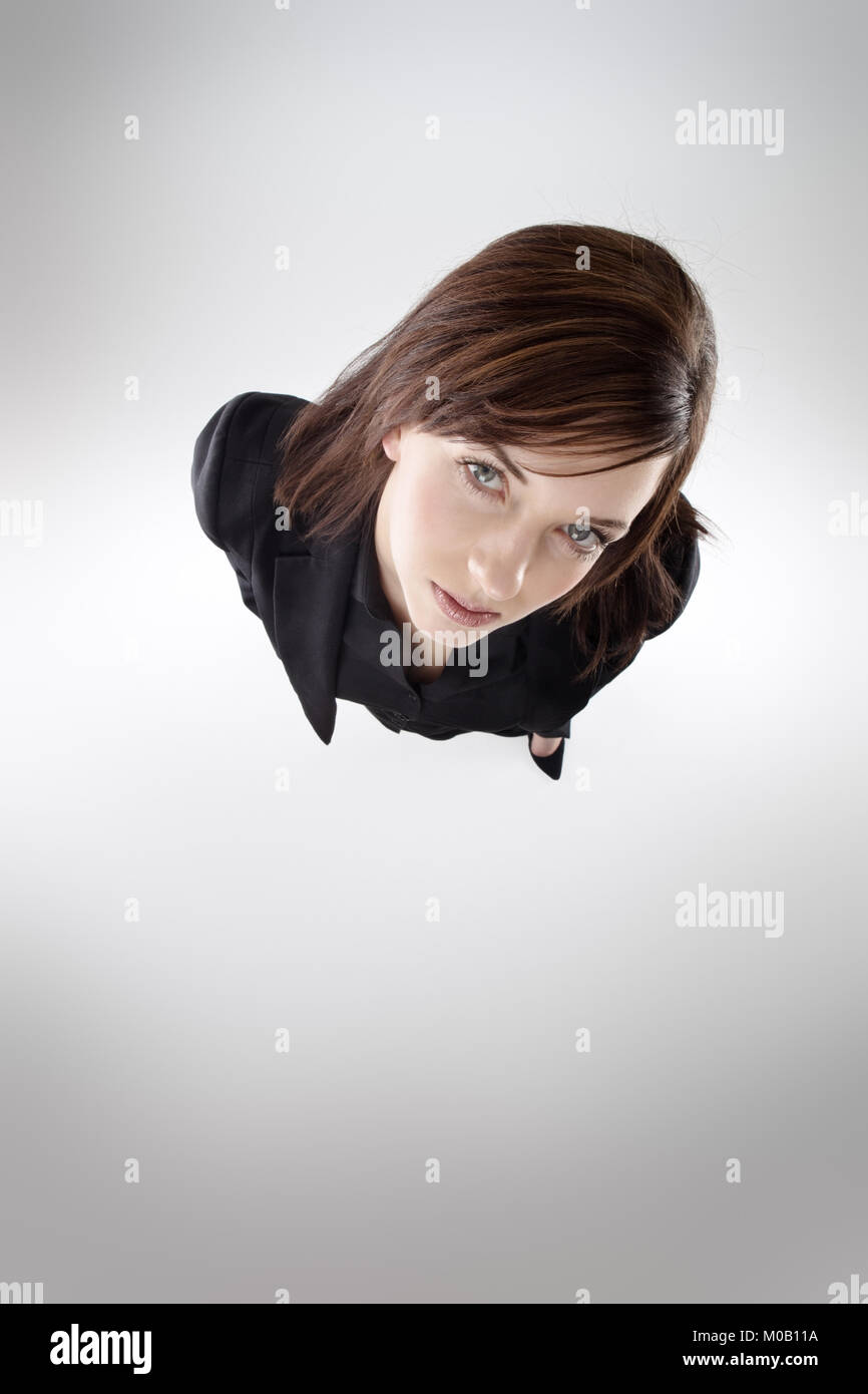 business woman shot from above looking up at camera Stock Photo - Alamy