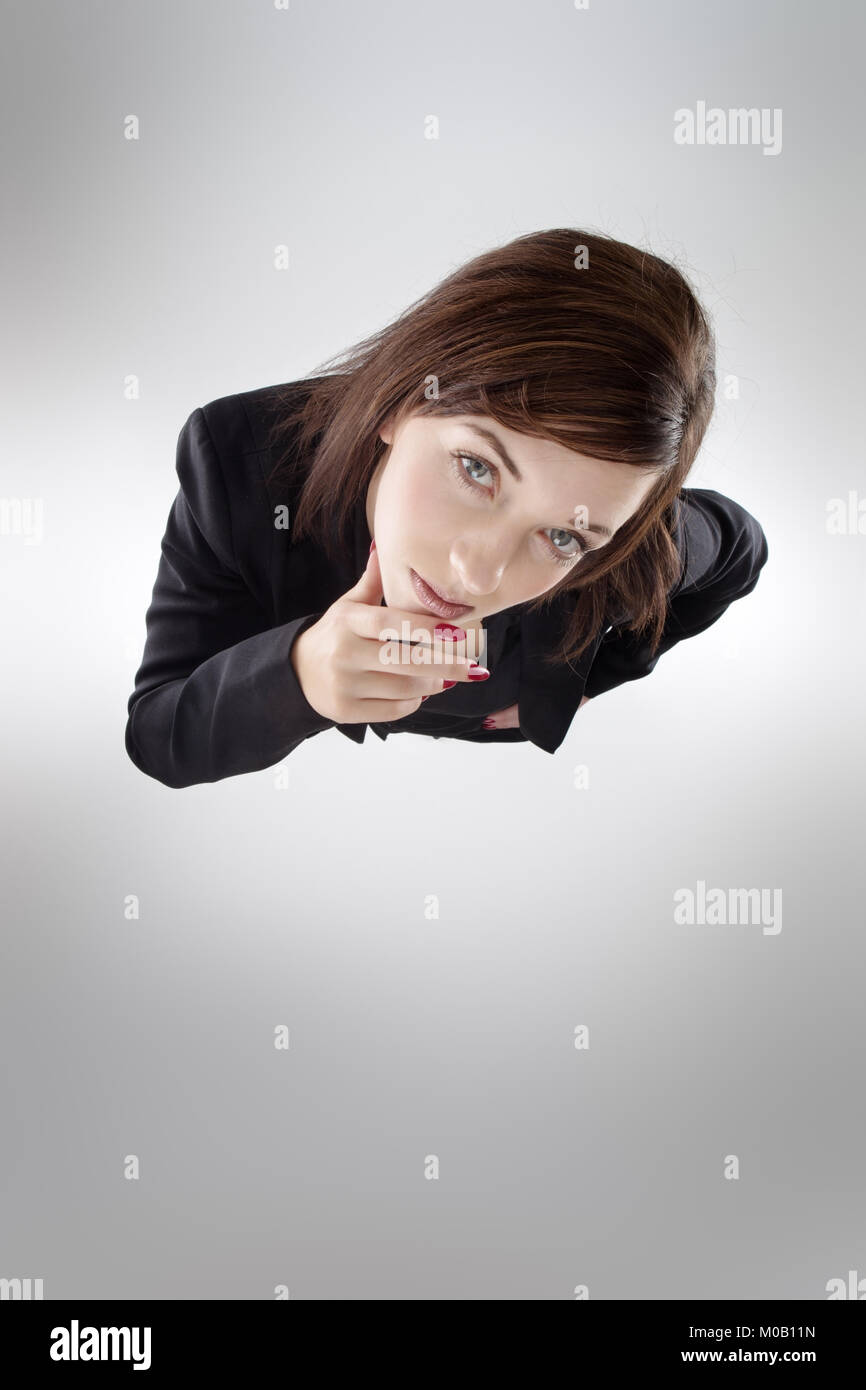 business woman shot from above looking up at camera Stock Photo - Alamy
