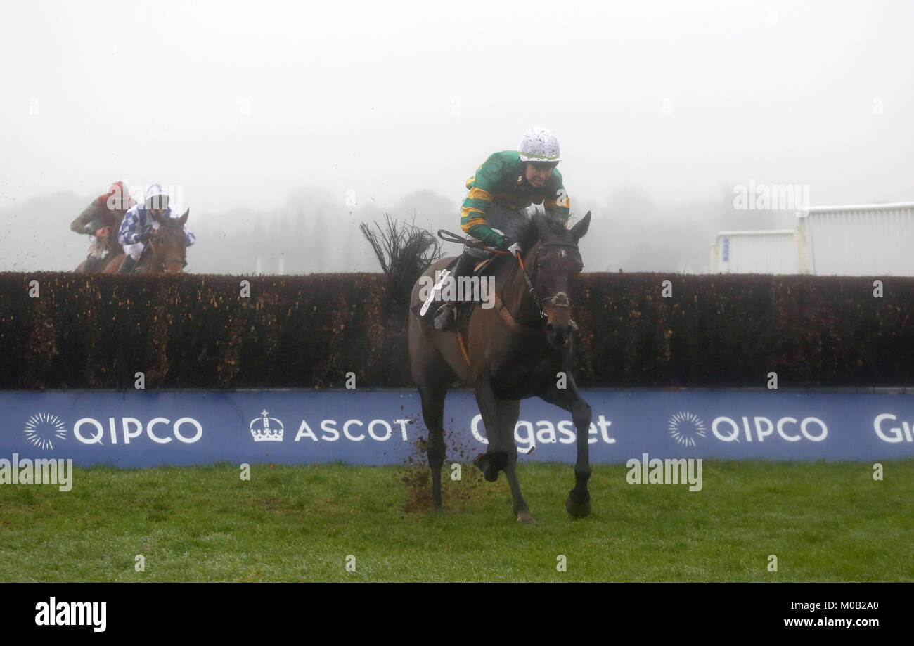 Miss Aine O' Connor and Drumcliff clear the last fence before going on ...