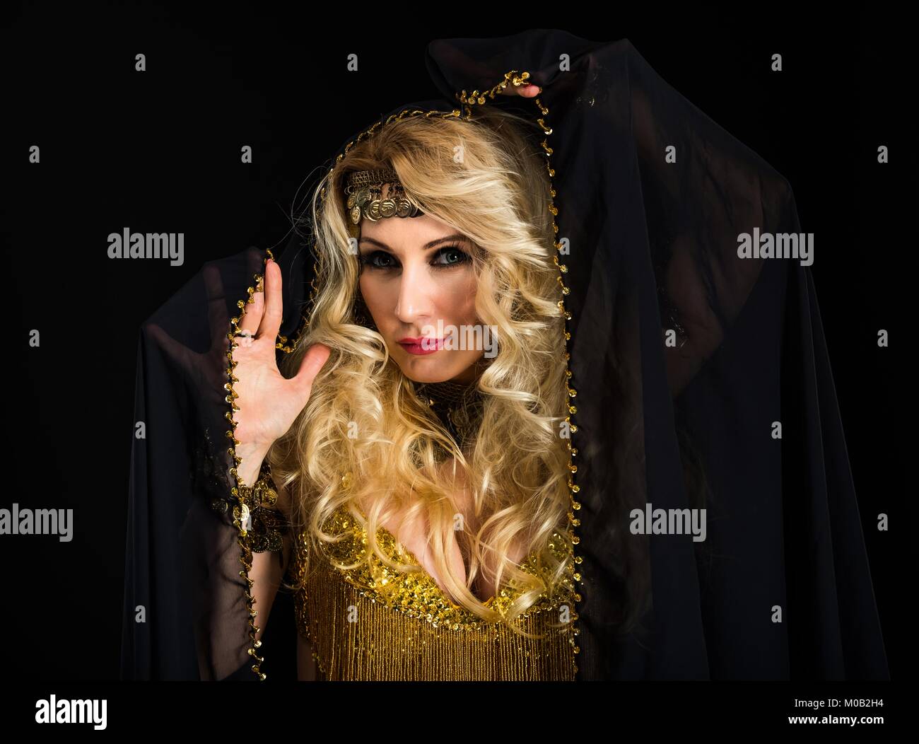 Woman fortune teller portrait at black Stock Photo - Alamy