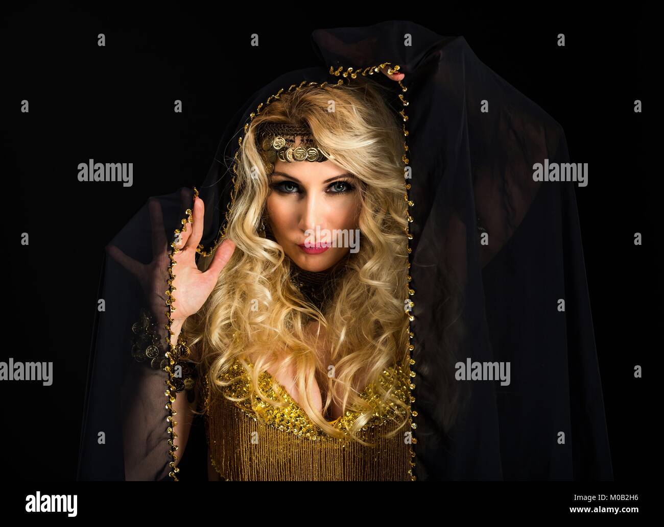 Woman fortune teller portrait at black Stock Photo - Alamy