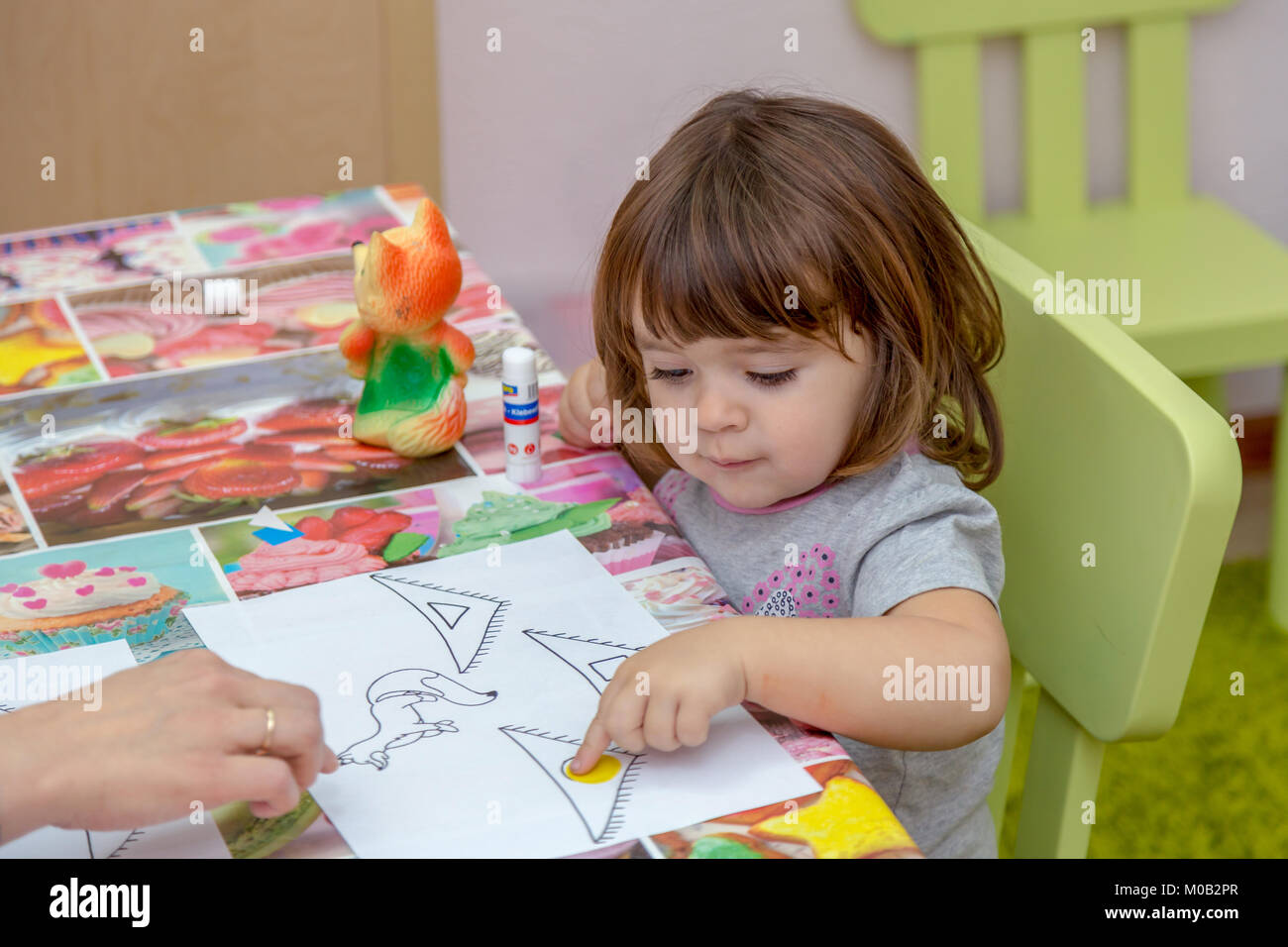 Little girl in preschool Stock Photo - Alamy