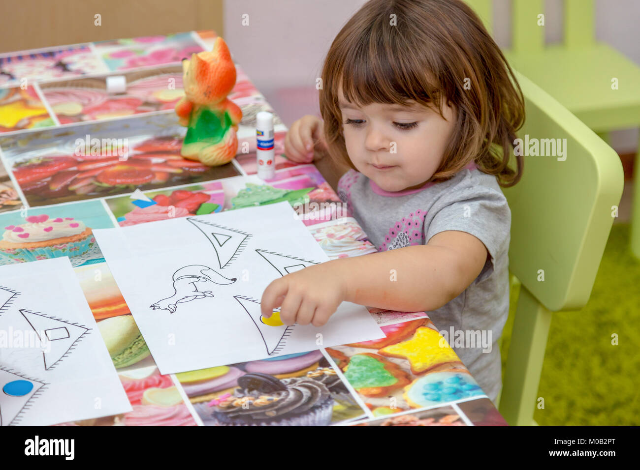 Little girl in preschool Stock Photo - Alamy