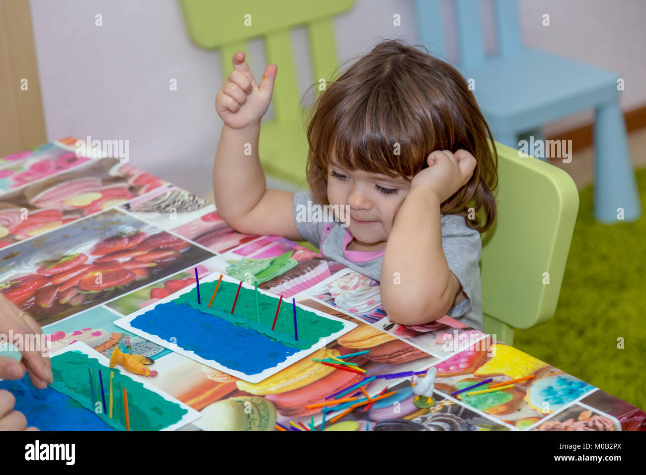 Little girl in preschool Stock Photo - Alamy