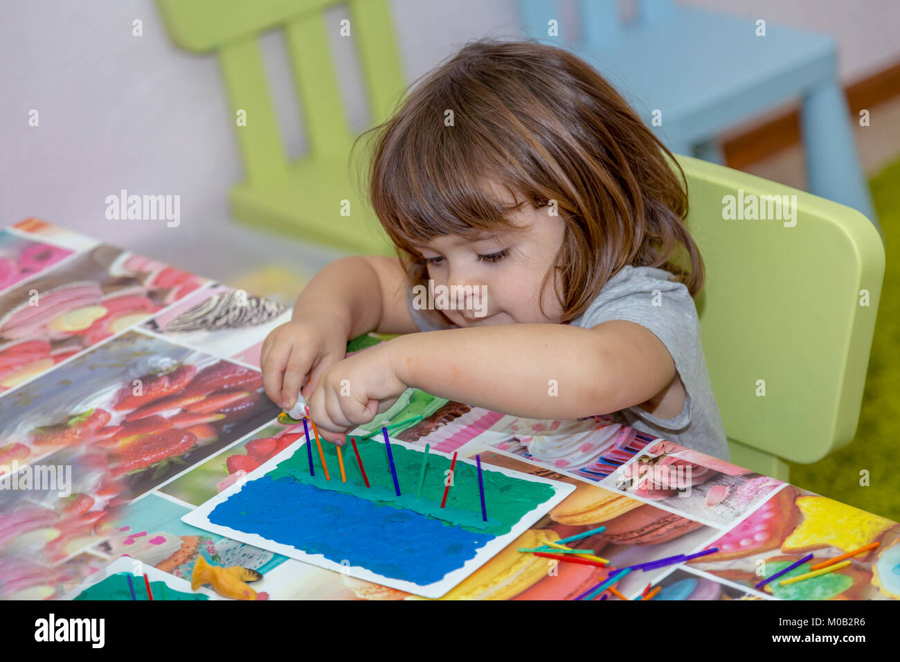 Little girl in preschool Stock Photo - Alamy