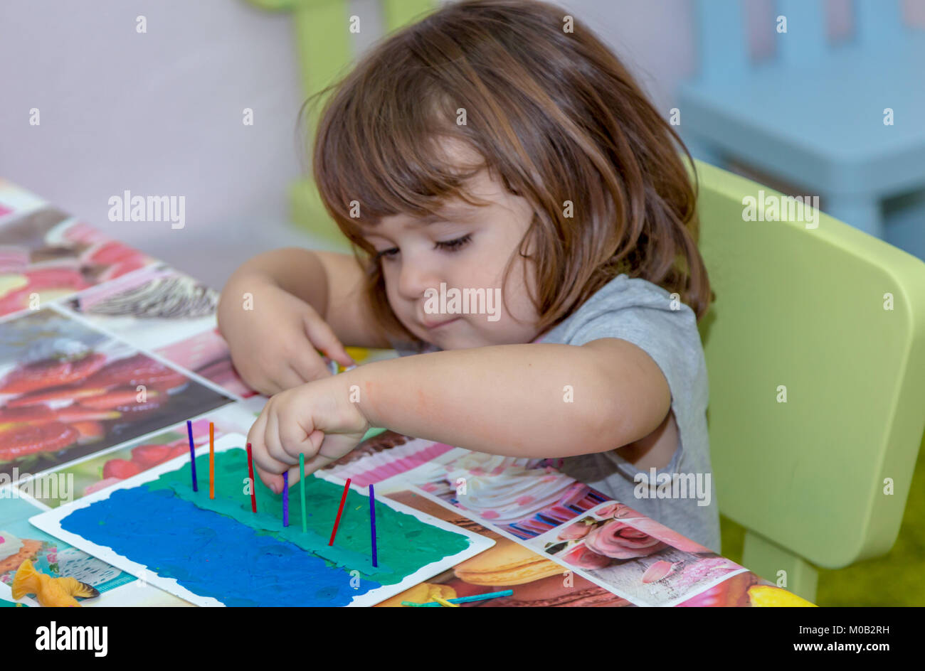 Little girl in preschool Stock Photo - Alamy