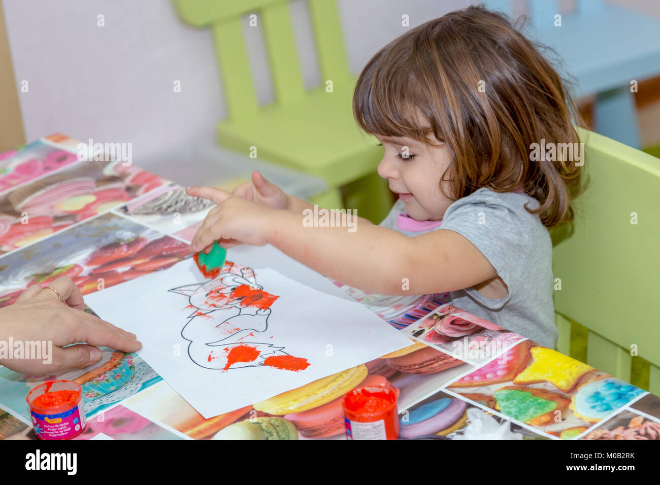 Little girl in preschool Stock Photo - Alamy