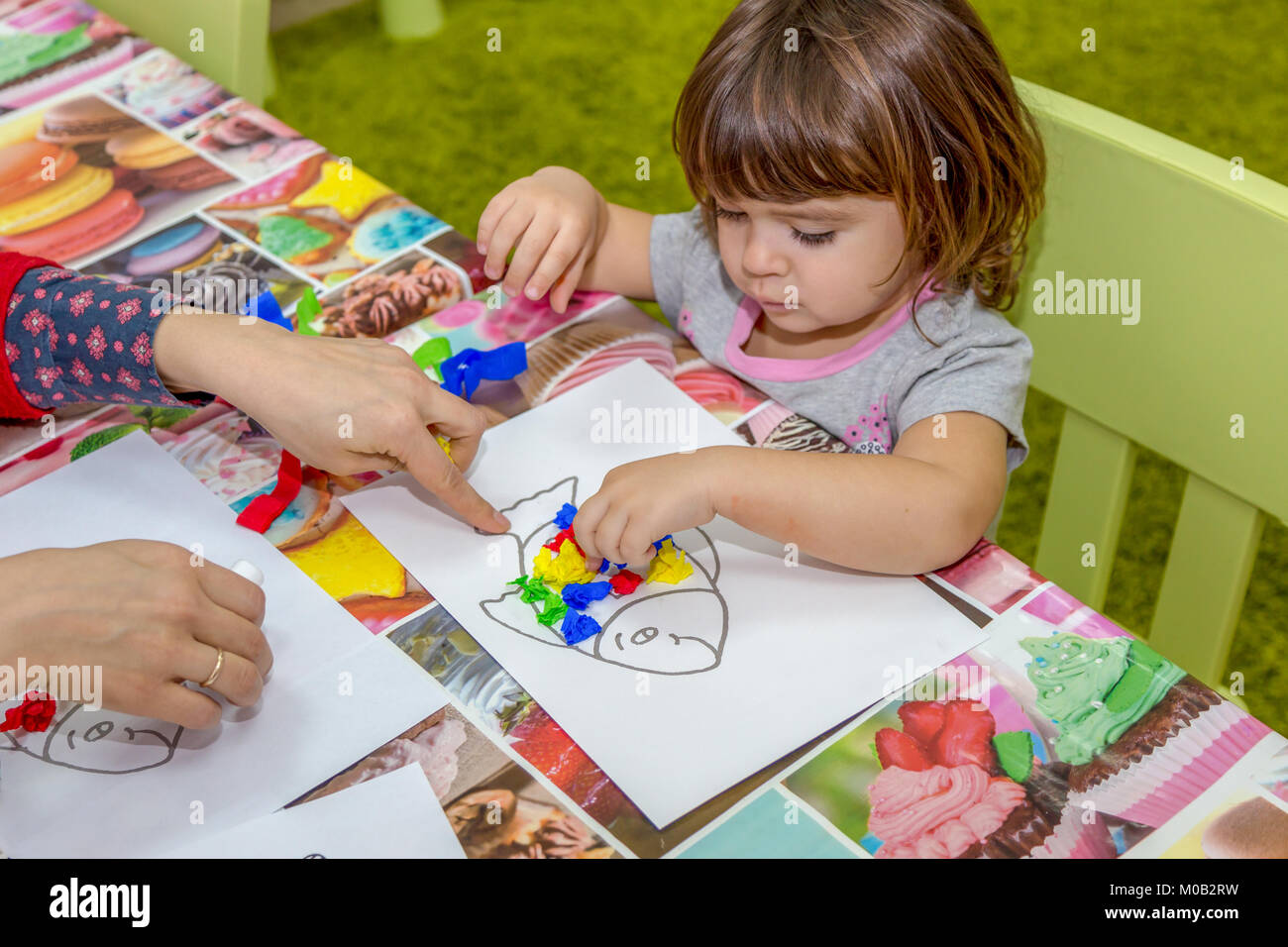 Little girl in preschool Stock Photo - Alamy