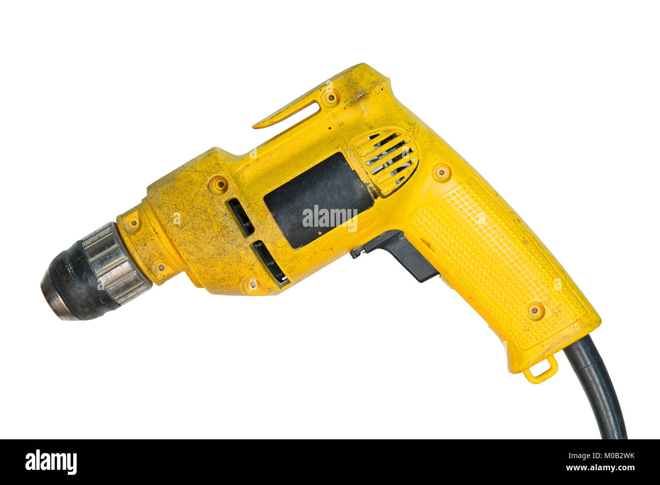 Old yellow drill isolated over a white background Stock Photo - Alamy