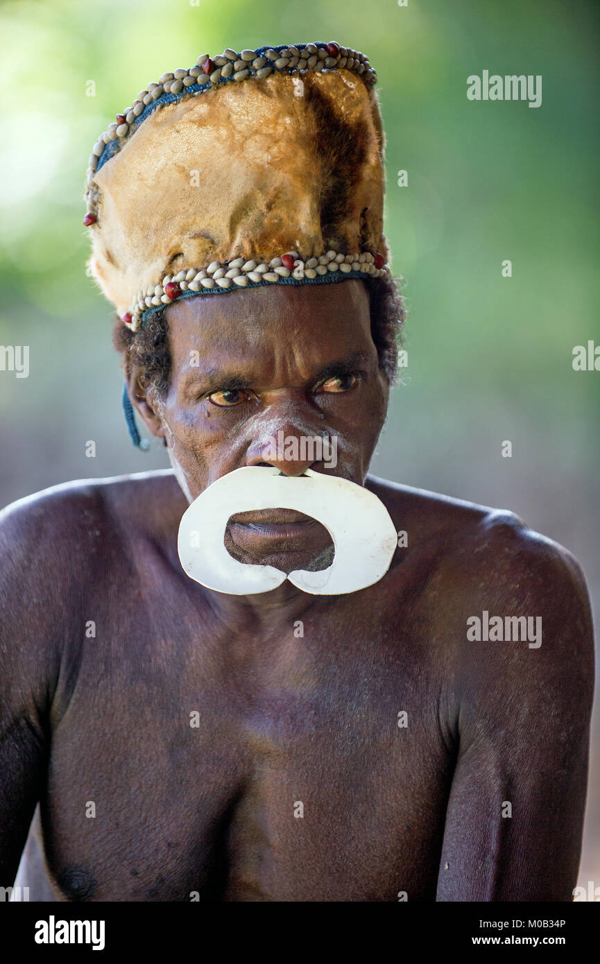Portrait of a man from the tribe of Asmat people on Asmat Welcoming ...