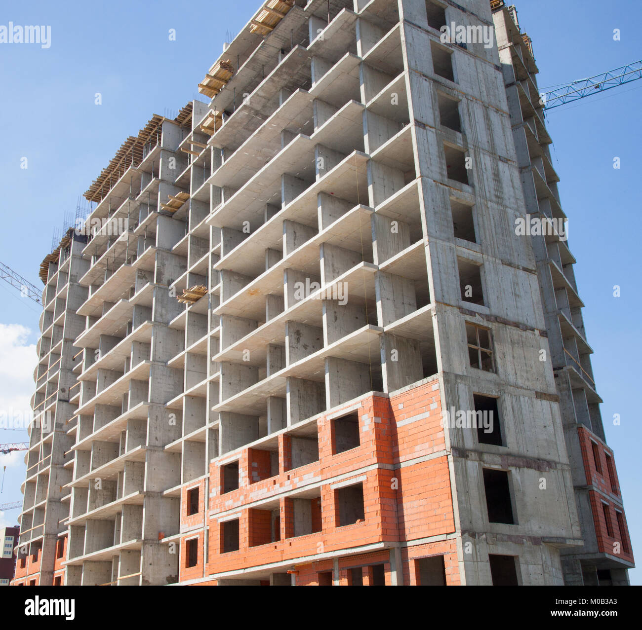 Apartment building under construction Stock Photo - Alamy