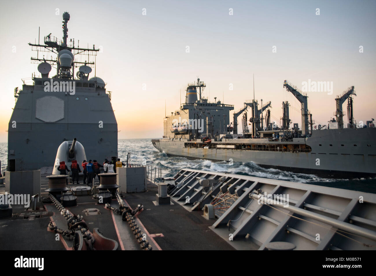The guided-missile cruiser USS Monterey (CG 61) alongside the underway ...