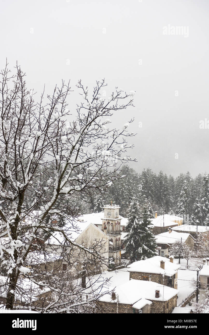 ELATI,TRIKALA/ GREECE- JANUARY 14 ,2018: Houses and streets are covered ...