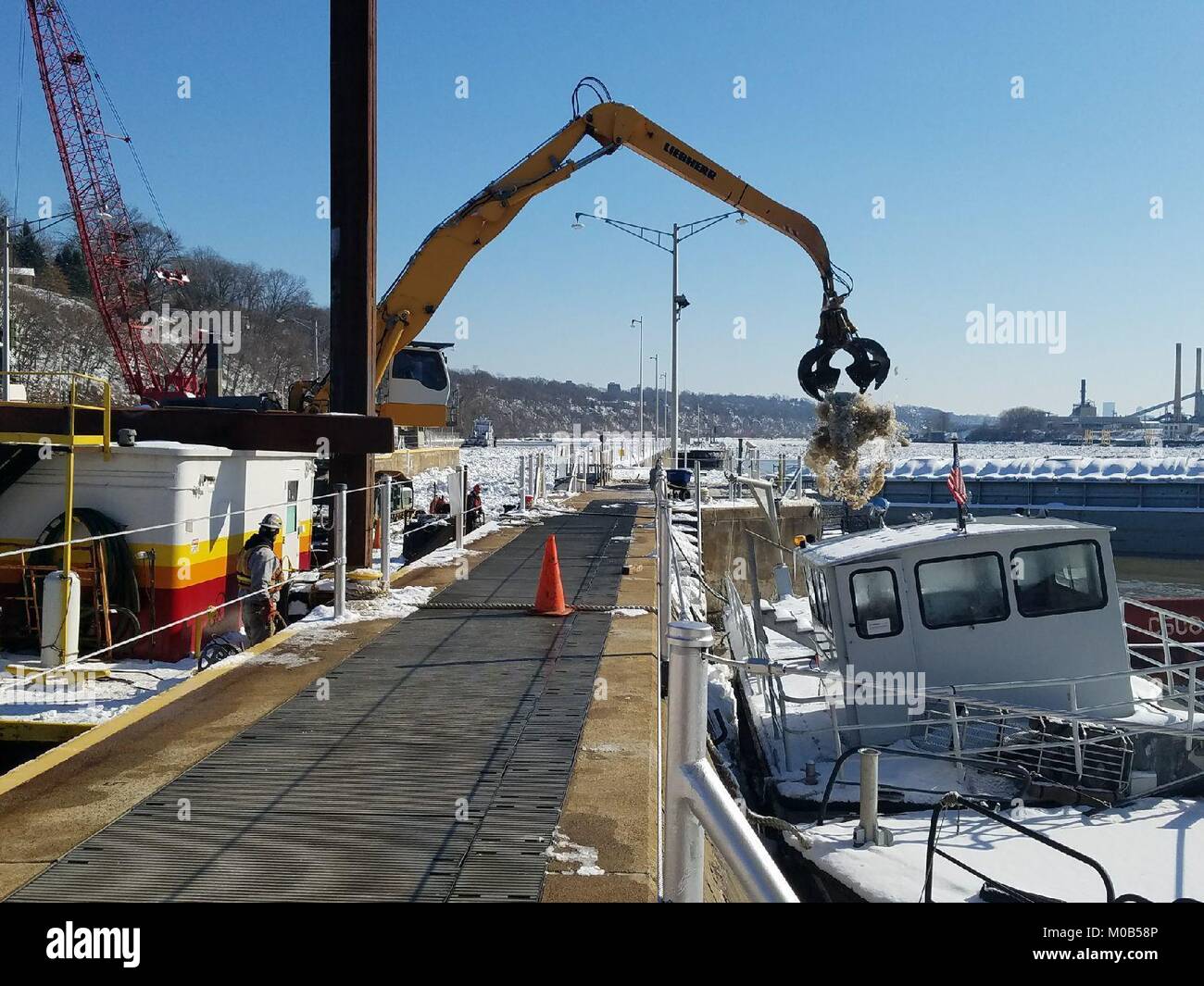 The U.S. Army Corps of Engineers and River Salvage conduct ice breaking ...