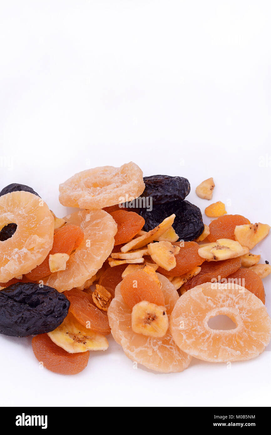 Close up of different dried fruits. Healthy food. Isolated white ...
