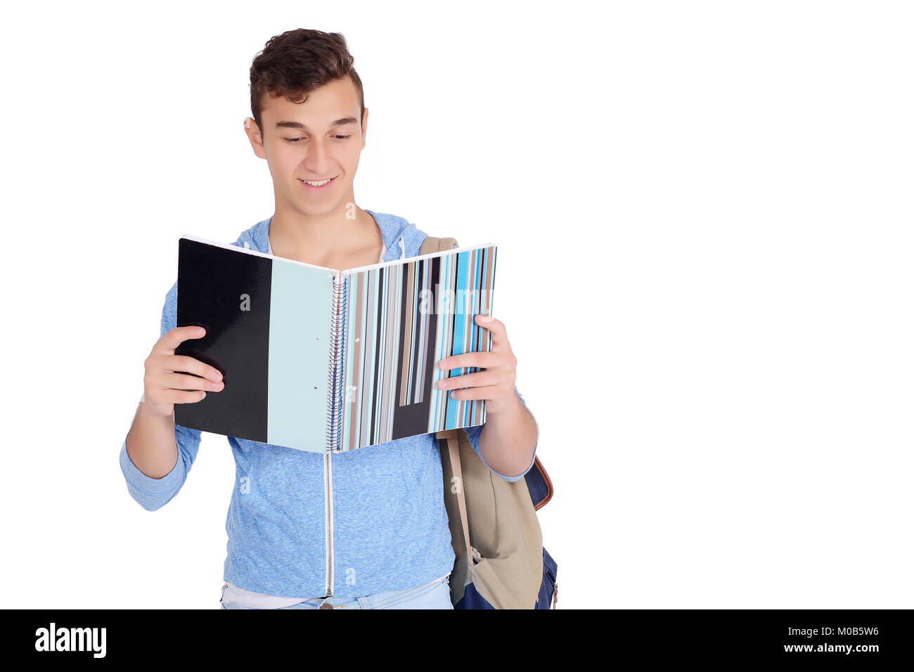 Portrait of happy smiling student with notebook and bag. Isolated on ...