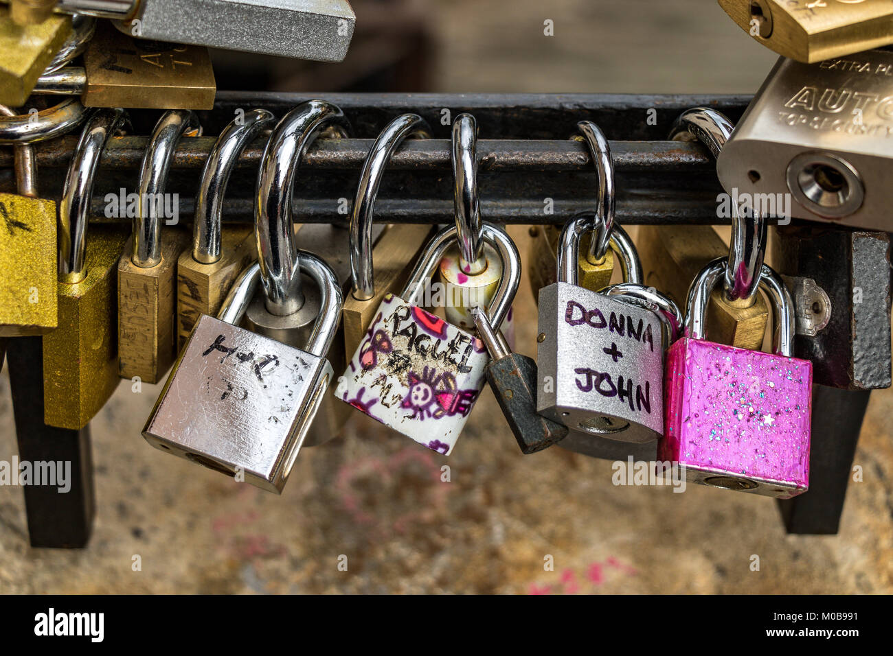Padlocks known as Love locks left by visitors at the Lovers bridge ...