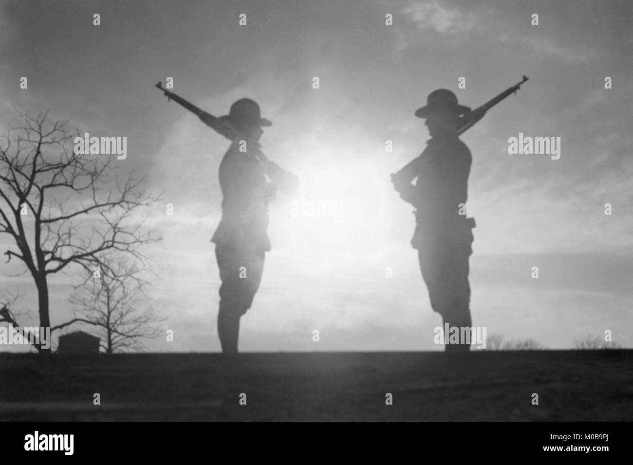 Army Sentinels at Sunset Stock Photo - Alamy