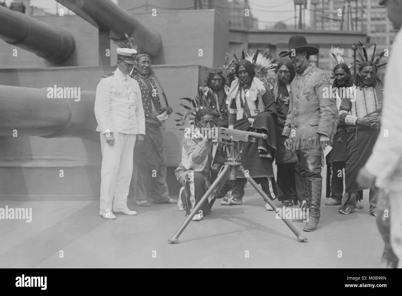 On Board, the "Recruit' a Native American aims a machine gun Stock ...