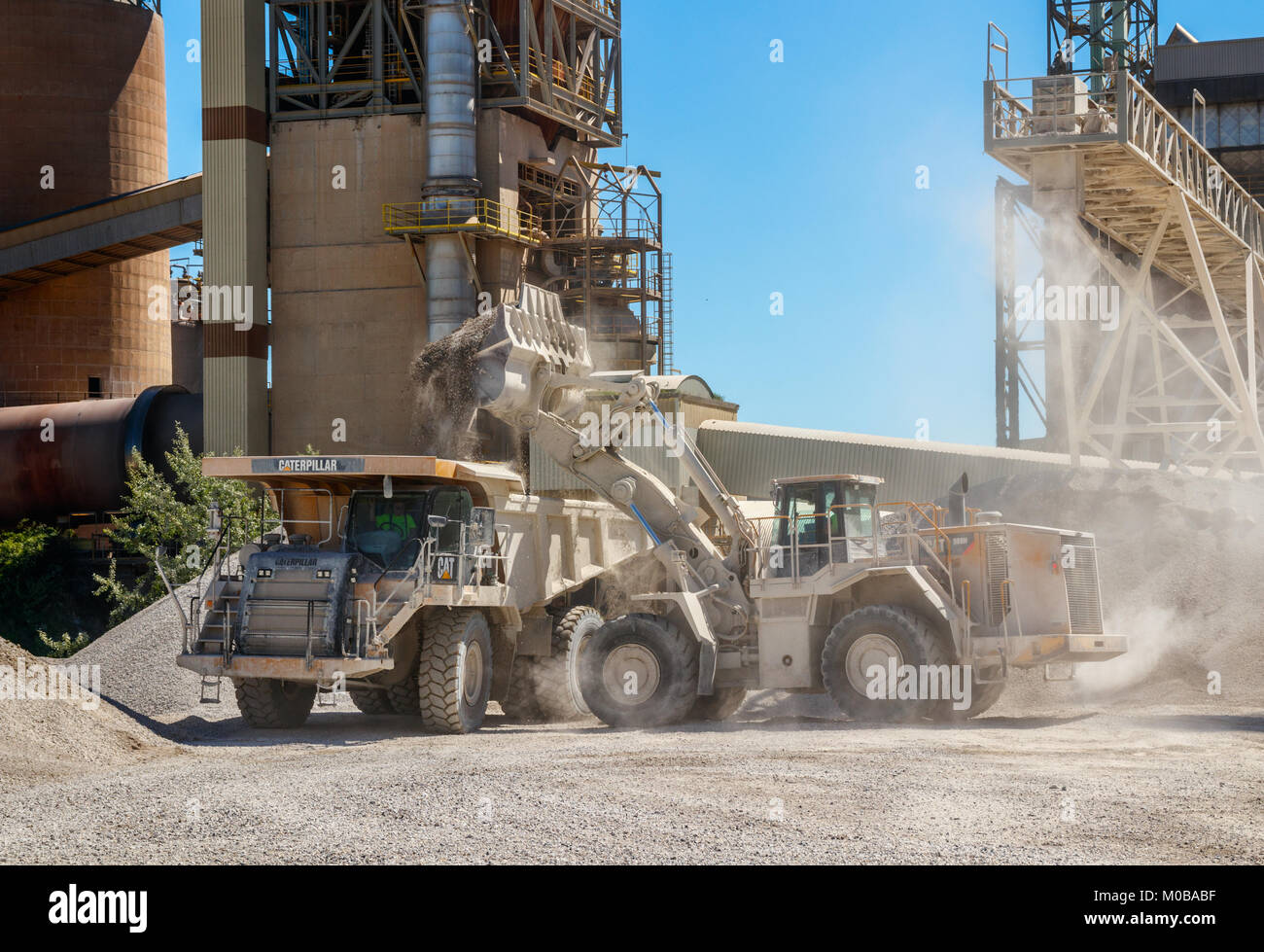 Wheel loader fills a Caterpiller dump truck with marl at the Mount ...
