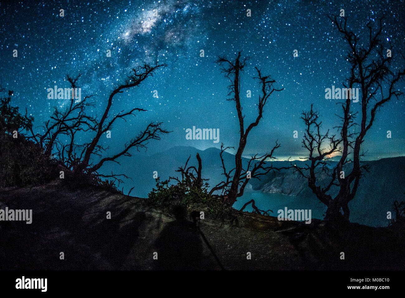 Stars in sky spotted over Ijen sulphur volcano, Indonesia Stock Photo ...