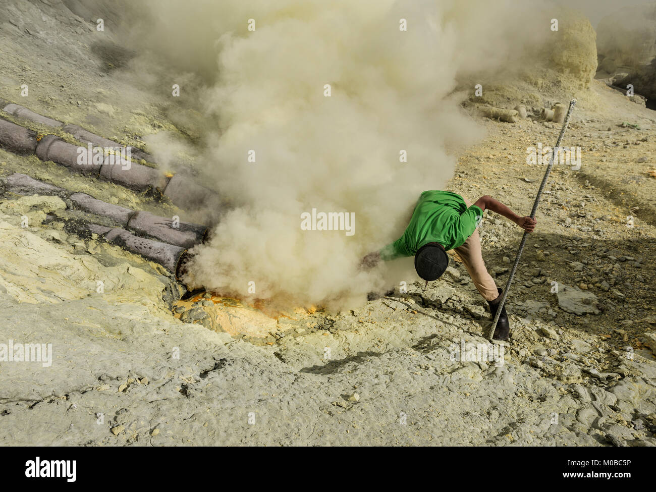 Sulphur miner working in extremely harsh environment to extract sulphur ...