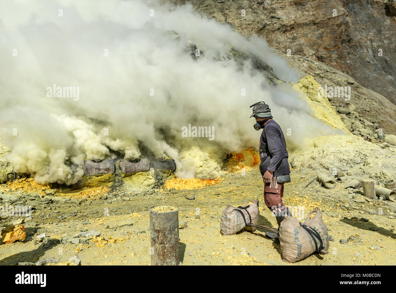 Sulphur miner working in extremely harsh environment to extract sulphur ...
