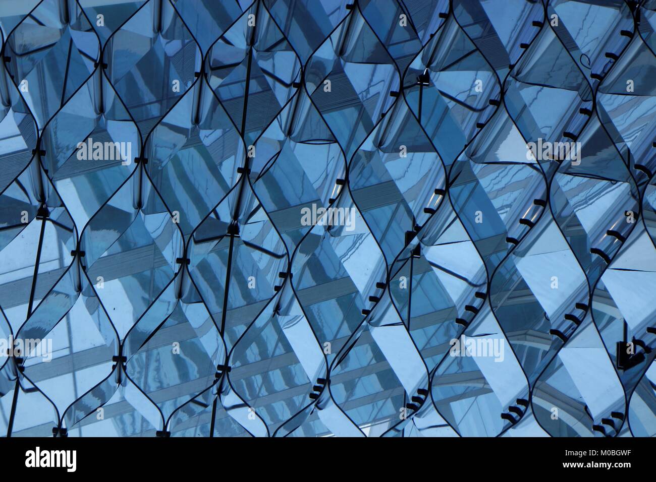Geometric blue glass pattern on skyscraper Stock Photo - Alamy