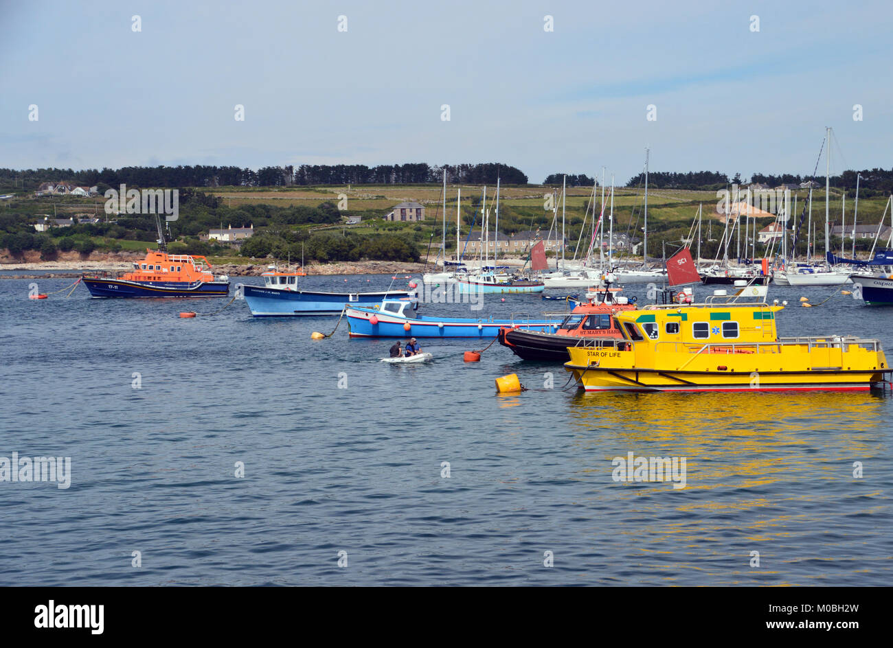 Small Sailing & Pleasure Boats Anchored in the Bay in Hugh Town Harbour ...