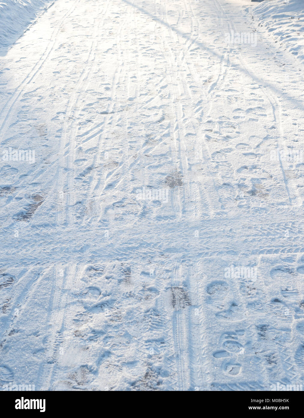 Footprints in the fresh snow Stock Photo - Alamy