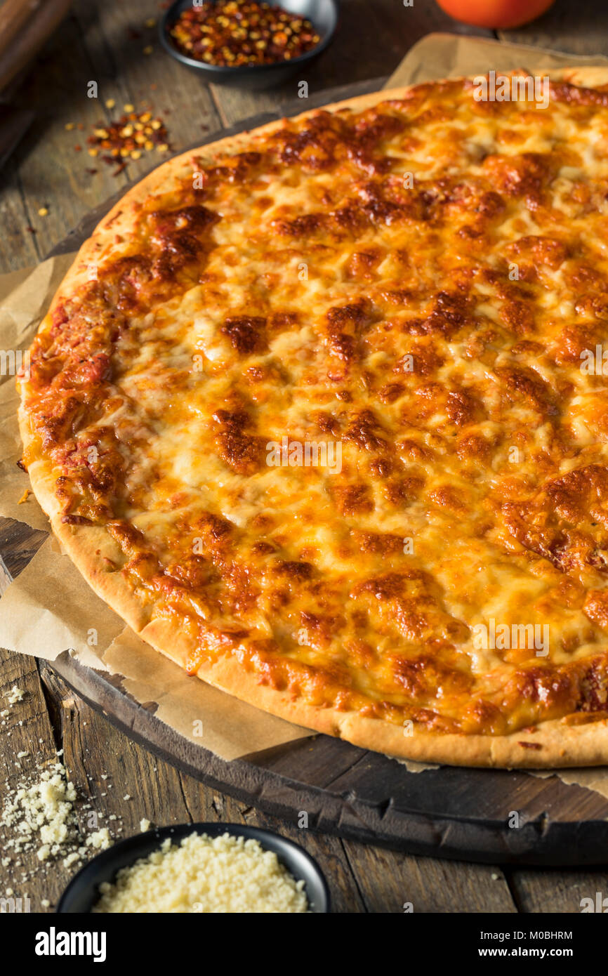 Delicious Homemade Cheese PIzza Cut into Square Slices Stock Photo - Alamy