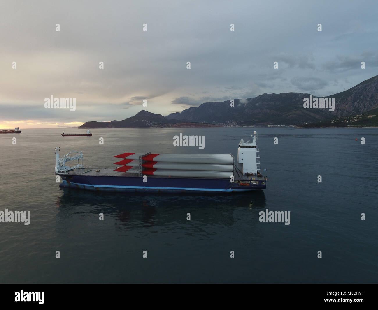Aerial view of a cargo vessel loaded with rotor blades for wind ...