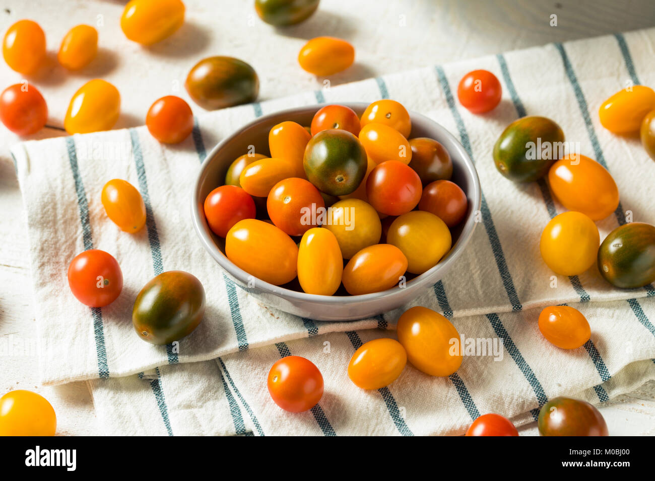 Organic Heirloom Cherry Tomatoes in a Bowl Stock Photo - Alamy
