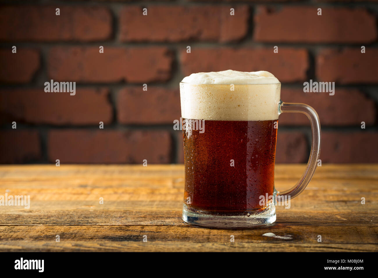 Empty mug and full lager glass hi-res stock photography and images - Alamy