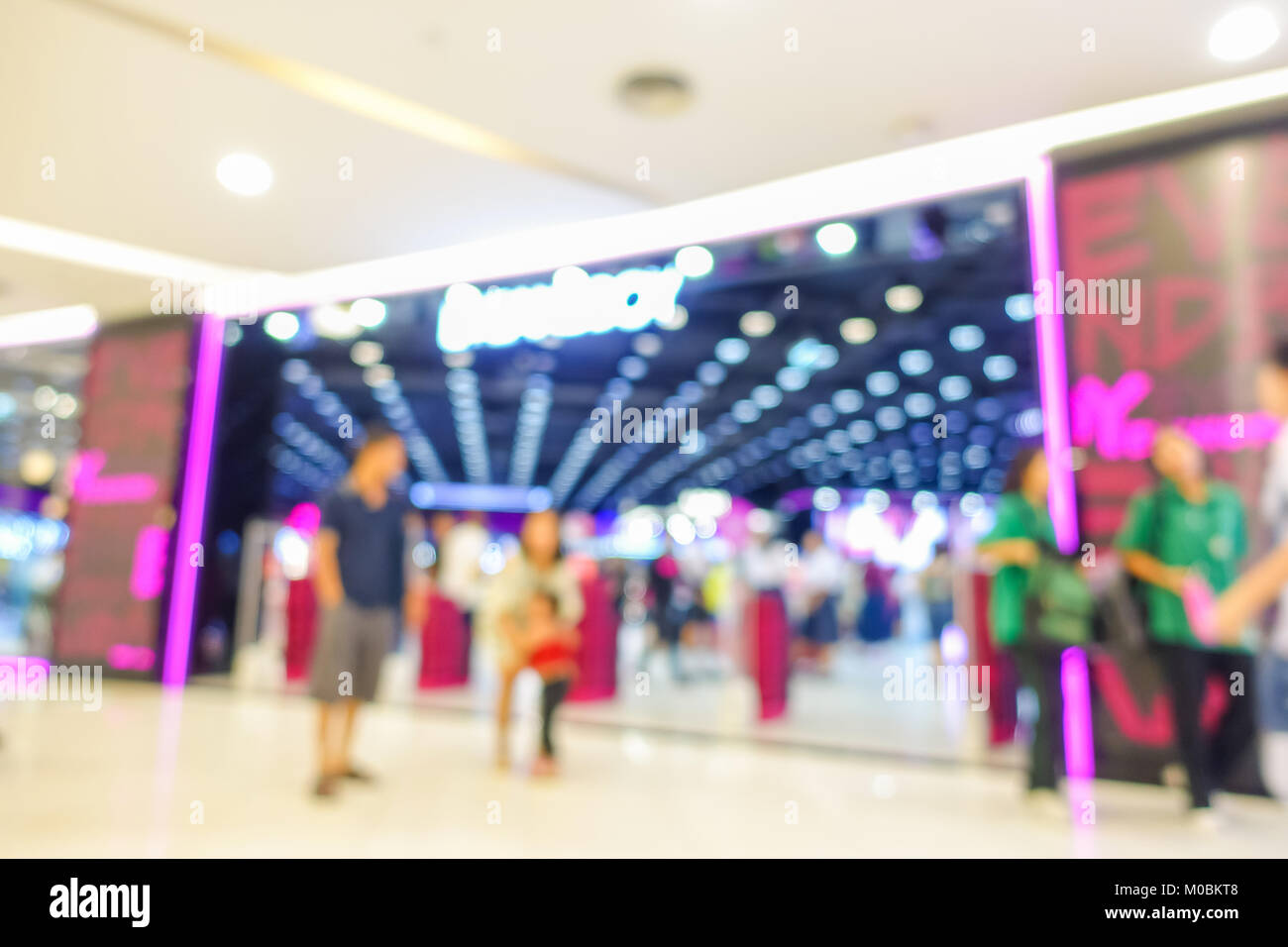 Blurred image of people walking to shopping at department store Stock ...