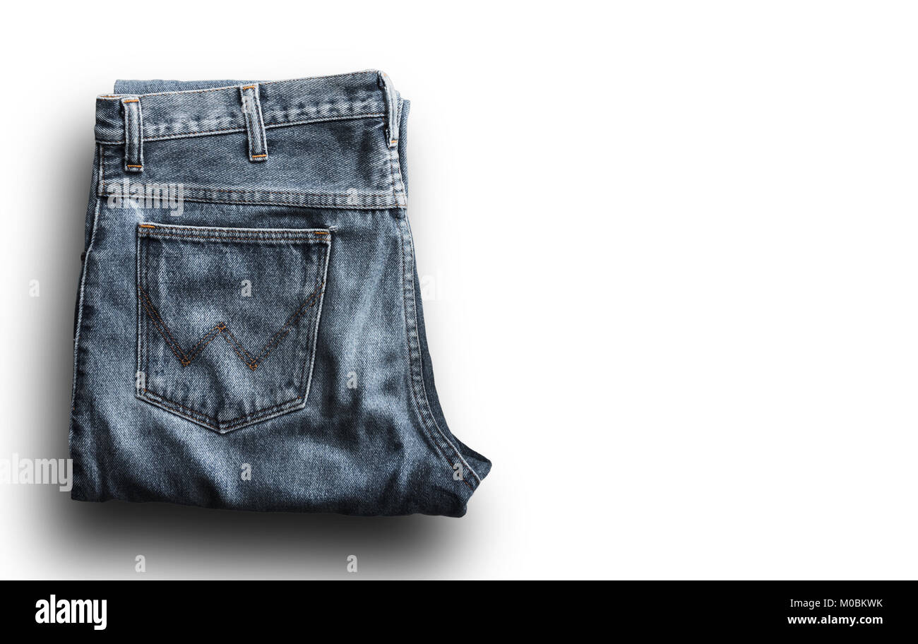 Close up top view of blue jeans isolated on white background with space ...