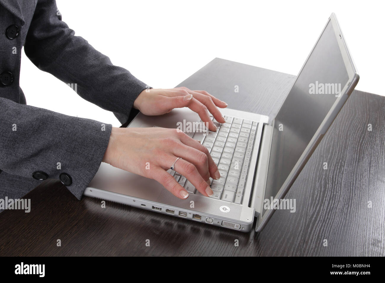 Two female hands on the laptop isolated on white background Stock Photo ...
