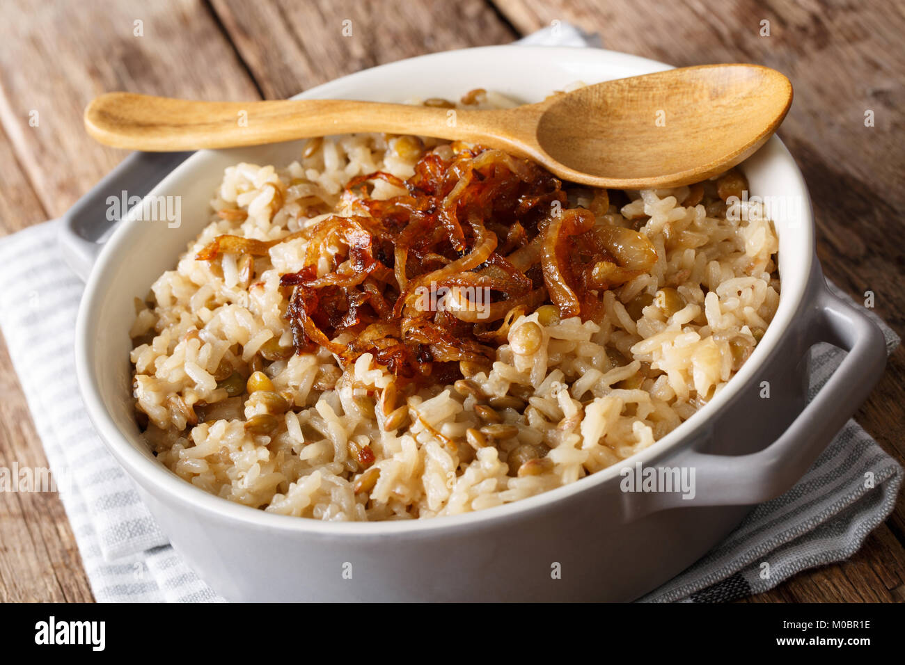 Middle Eastern food: Mujaddara rice with lentils and fried onions close ...