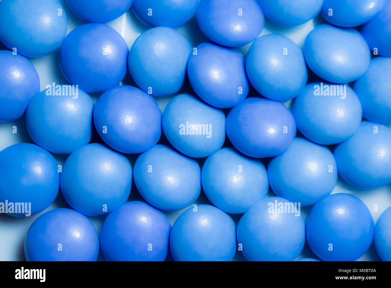 Close up a colorful candies of chocolates with blue colors Stock Photo ...