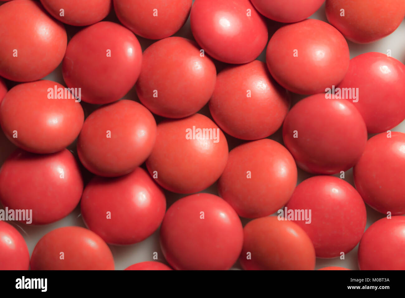 Close up a colorful candies of chocolates with red colors Stock Photo ...