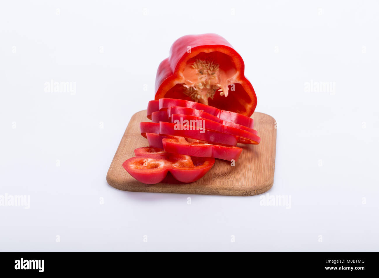 Sliced red pepper isolated on white background Stock Photo - Alamy