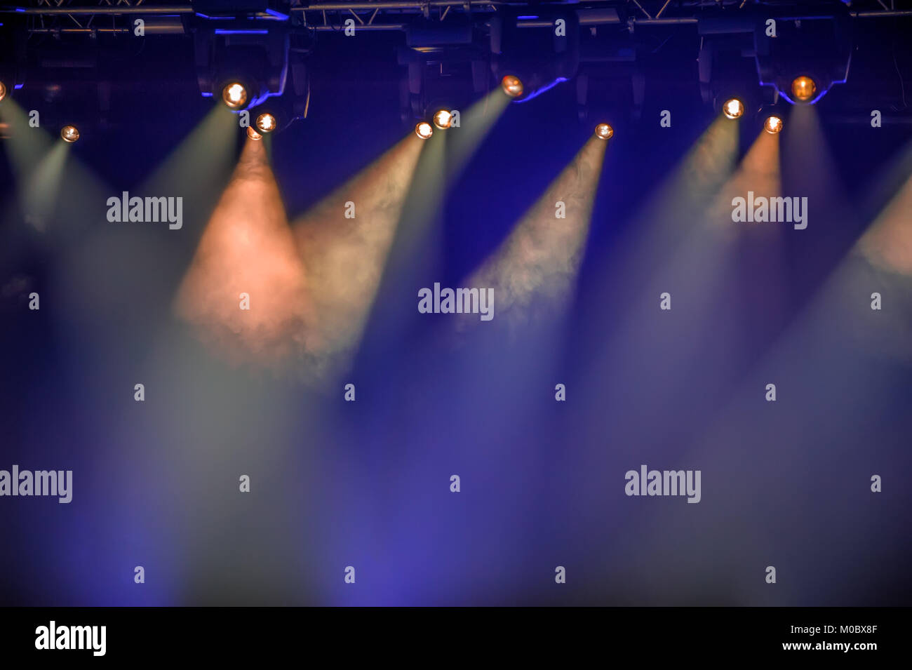 Stage spotlights hanging on lighting pipe systems Stock Photo - Alamy
