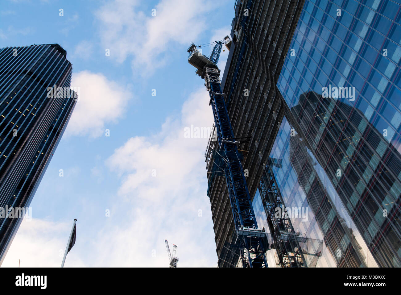 Construction site of new buildings being built in city Stock Photo - Alamy