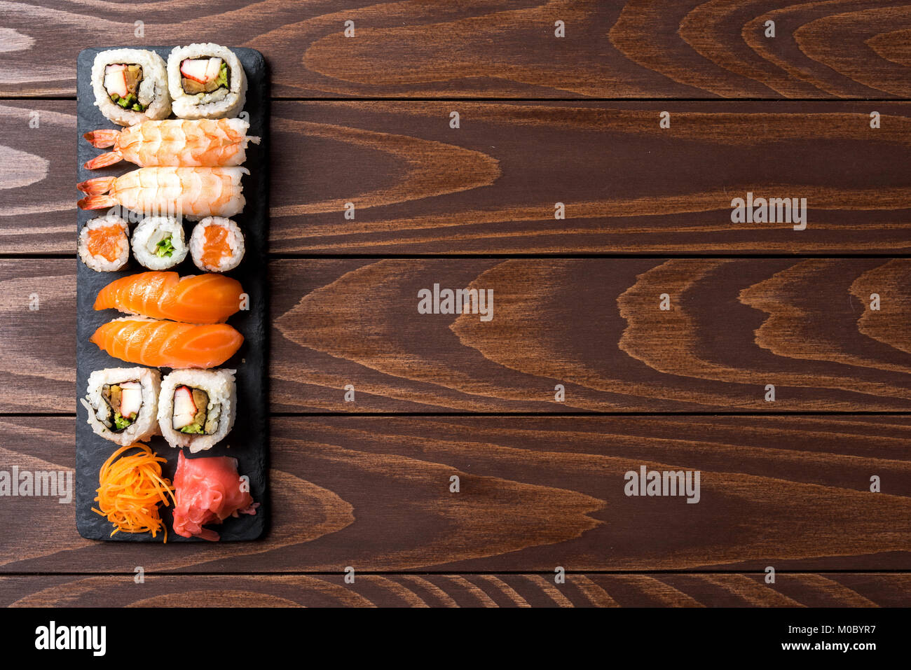 Set of Japanese sushi on wooden background. Close up Stock Photo - Alamy
