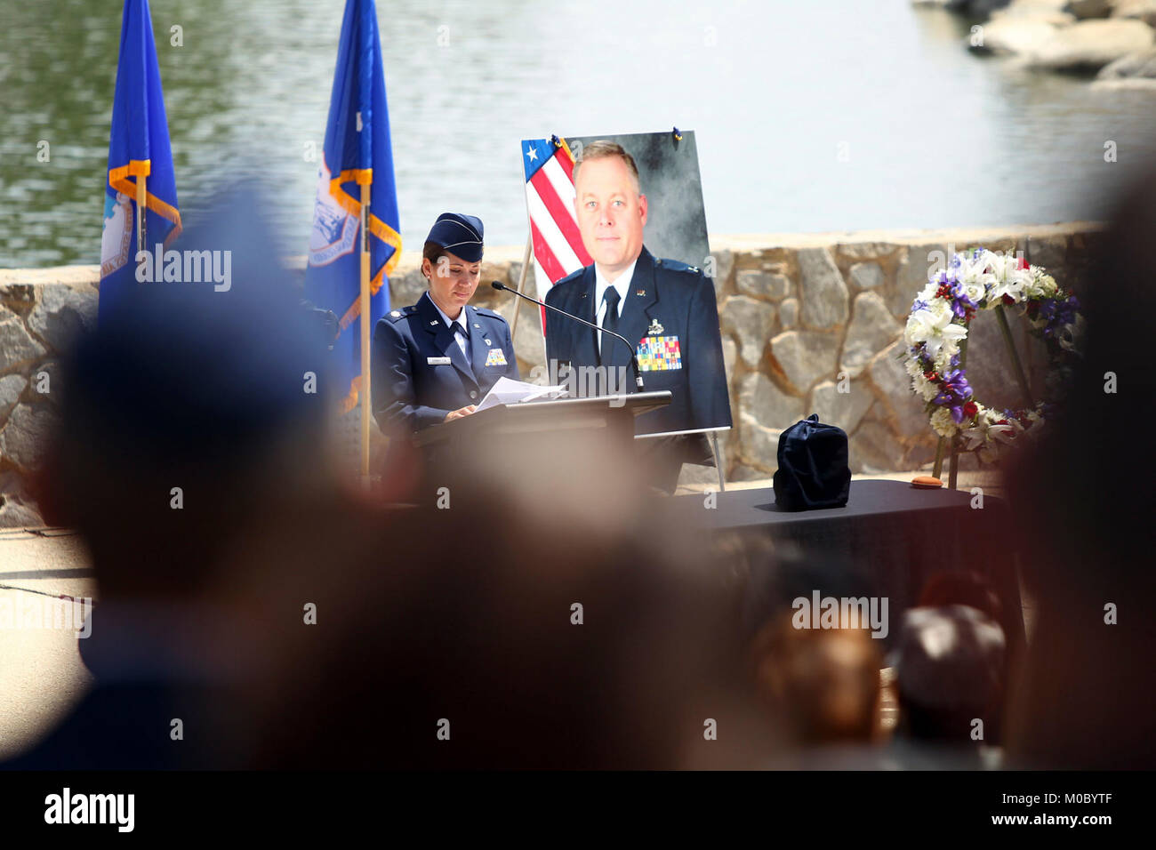 Maj. Jennifer Covington of the 163d Attack Wing reads the poem, “High ...