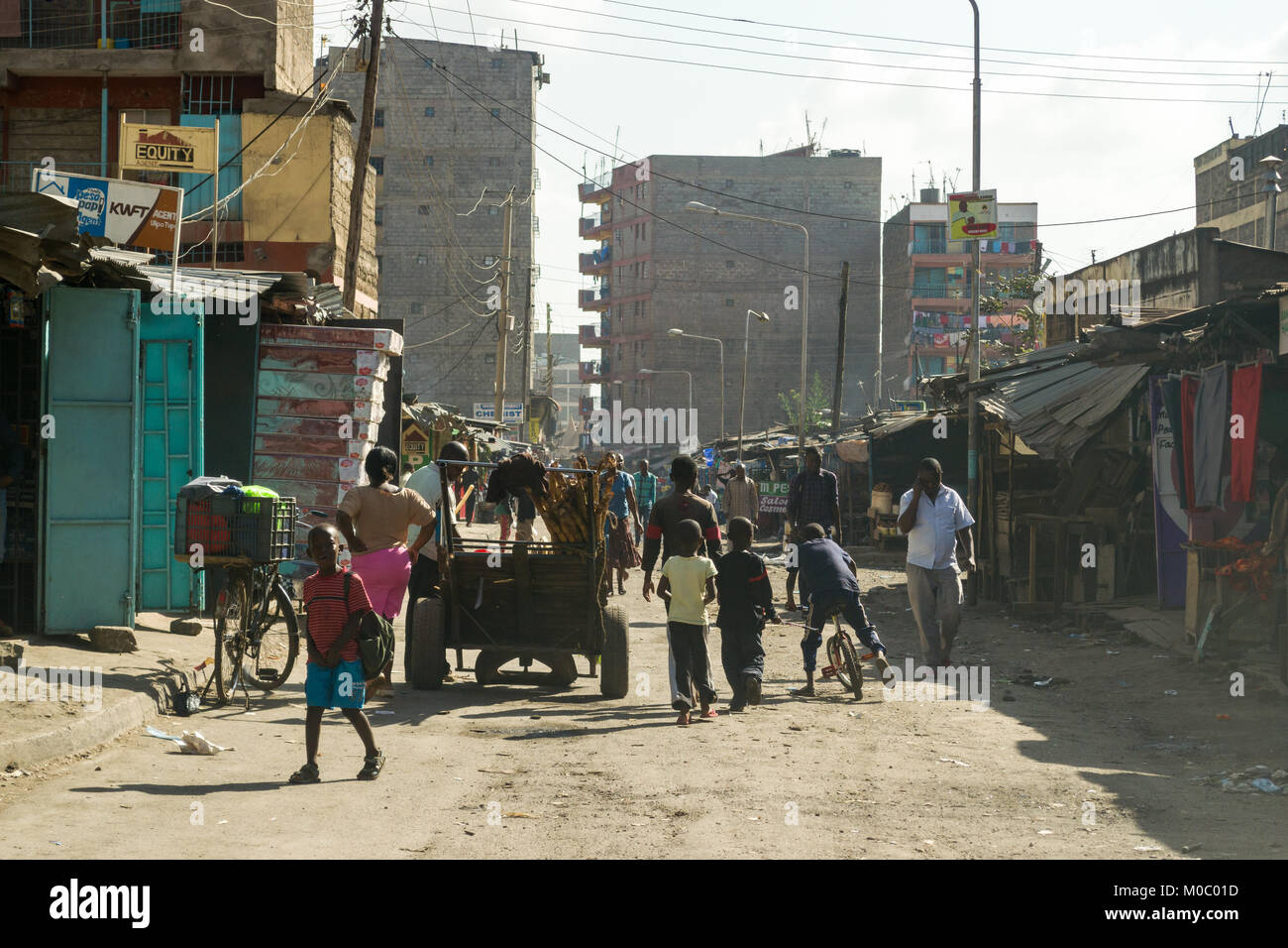 View down a road in Huruma, a district of Nairobi, showing people and ...