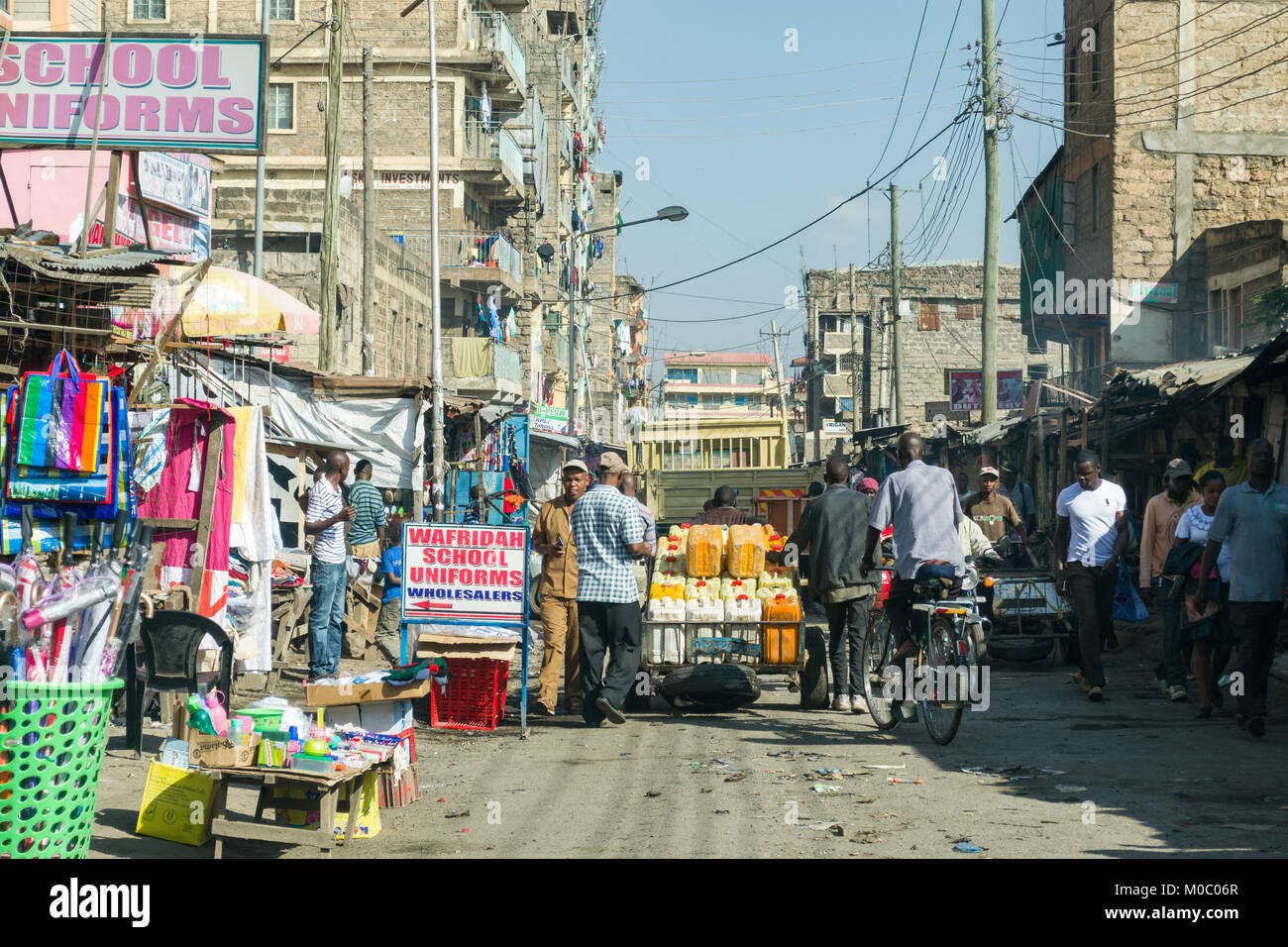 View down a road in Huruma, showing people shops and buildings, Nairobi ...
