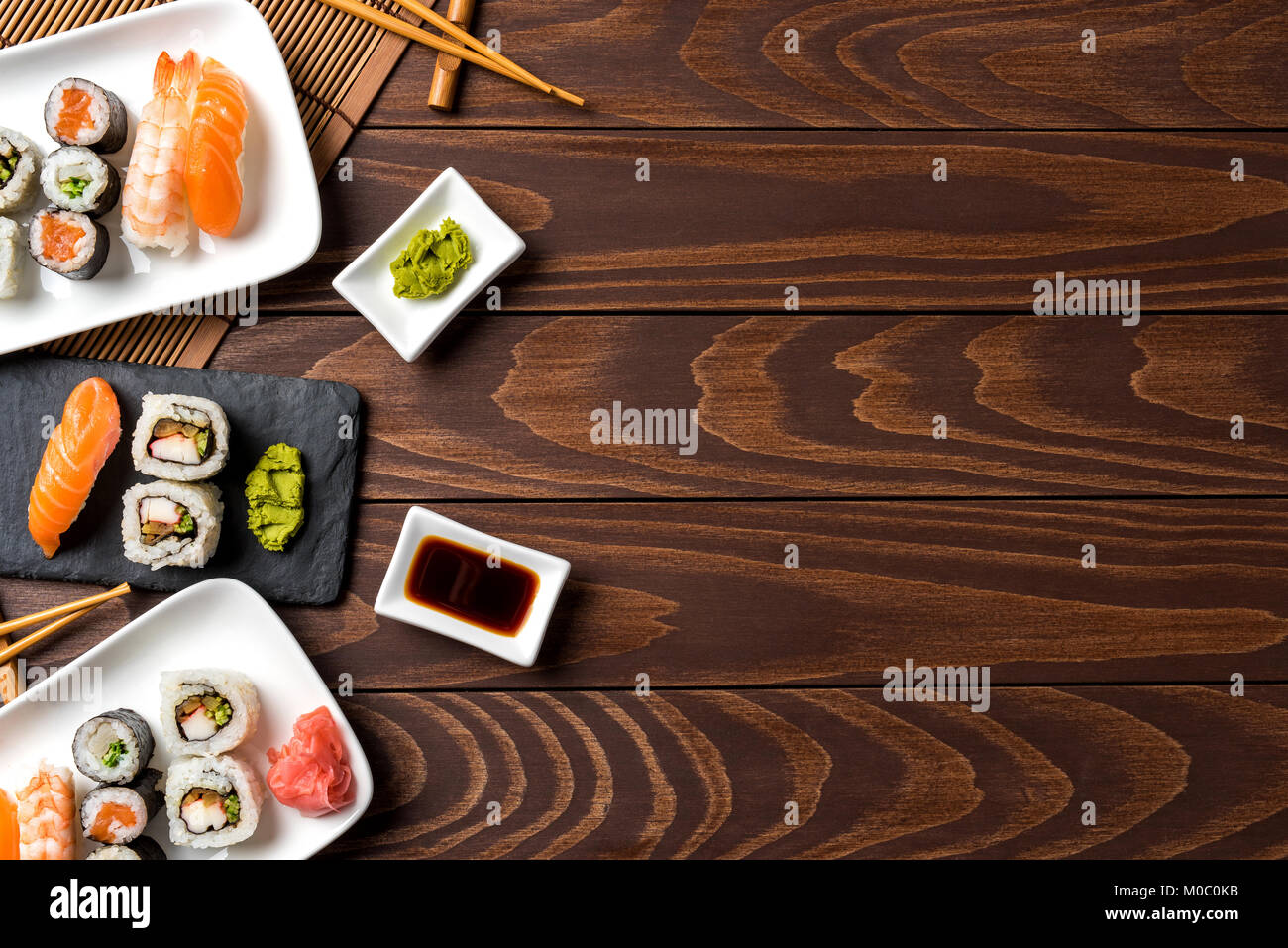 Set of Japanese sushi on wooden table. Top view Stock Photo - Alamy