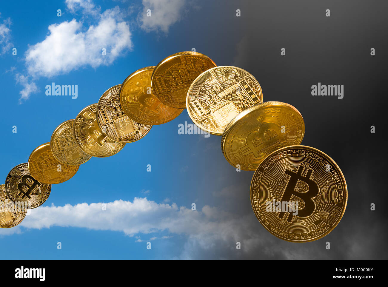 Bitcoin coins rising and falling from the sky Stock Photo - Alamy