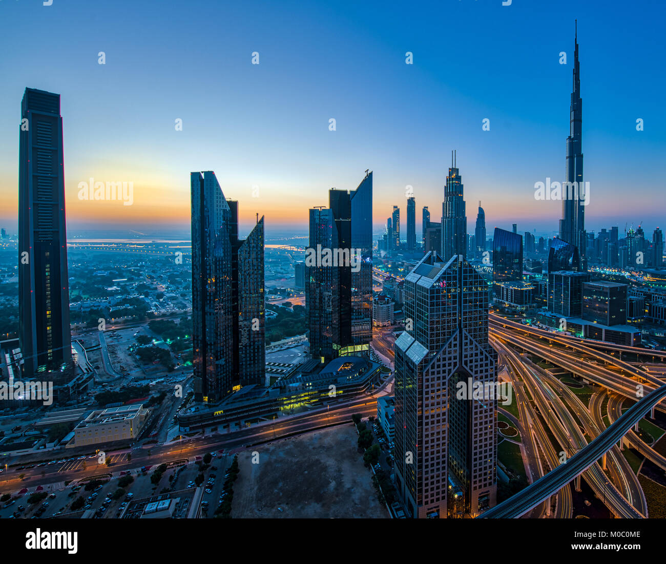 Dubai Skyline at sunset with view of the Burj Khalifa Stock Photo - Alamy